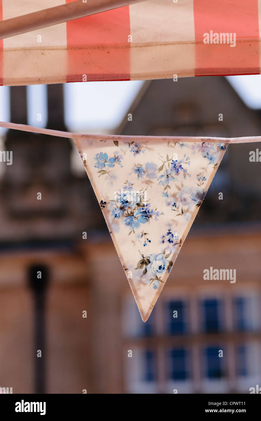 Traditional fabric bunting at a marquee Stock Photo - Alamy