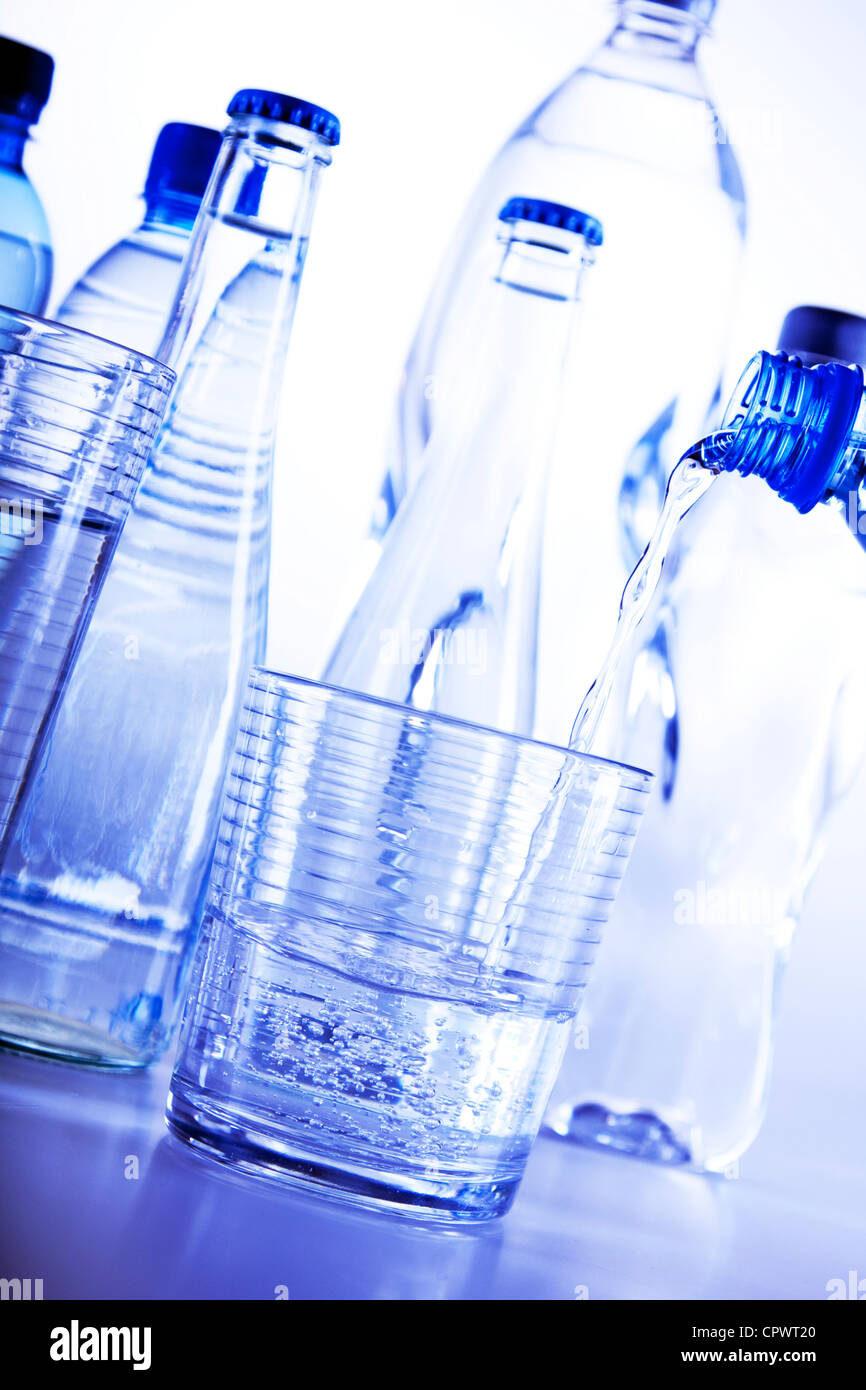 Drinking water in bootles and cup Stock Photo - Alamy