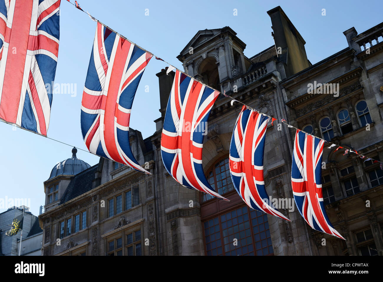 Union Jack flags flying in central London Stock Photo - Alamy