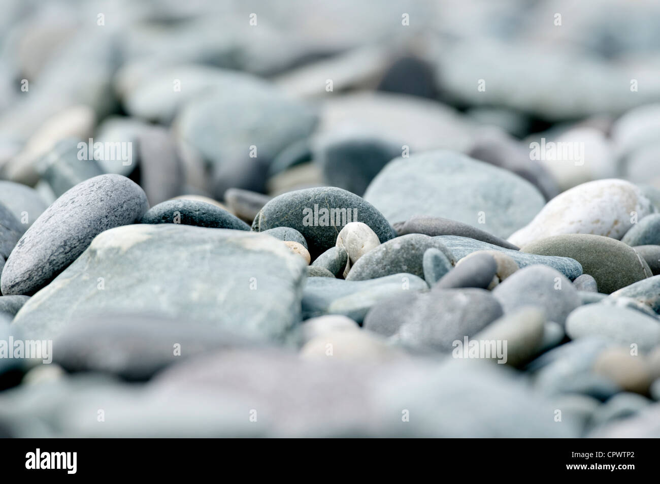 Pebbles on a beach at Cemlyn Bay Anglesey Stock Photo - Alamy