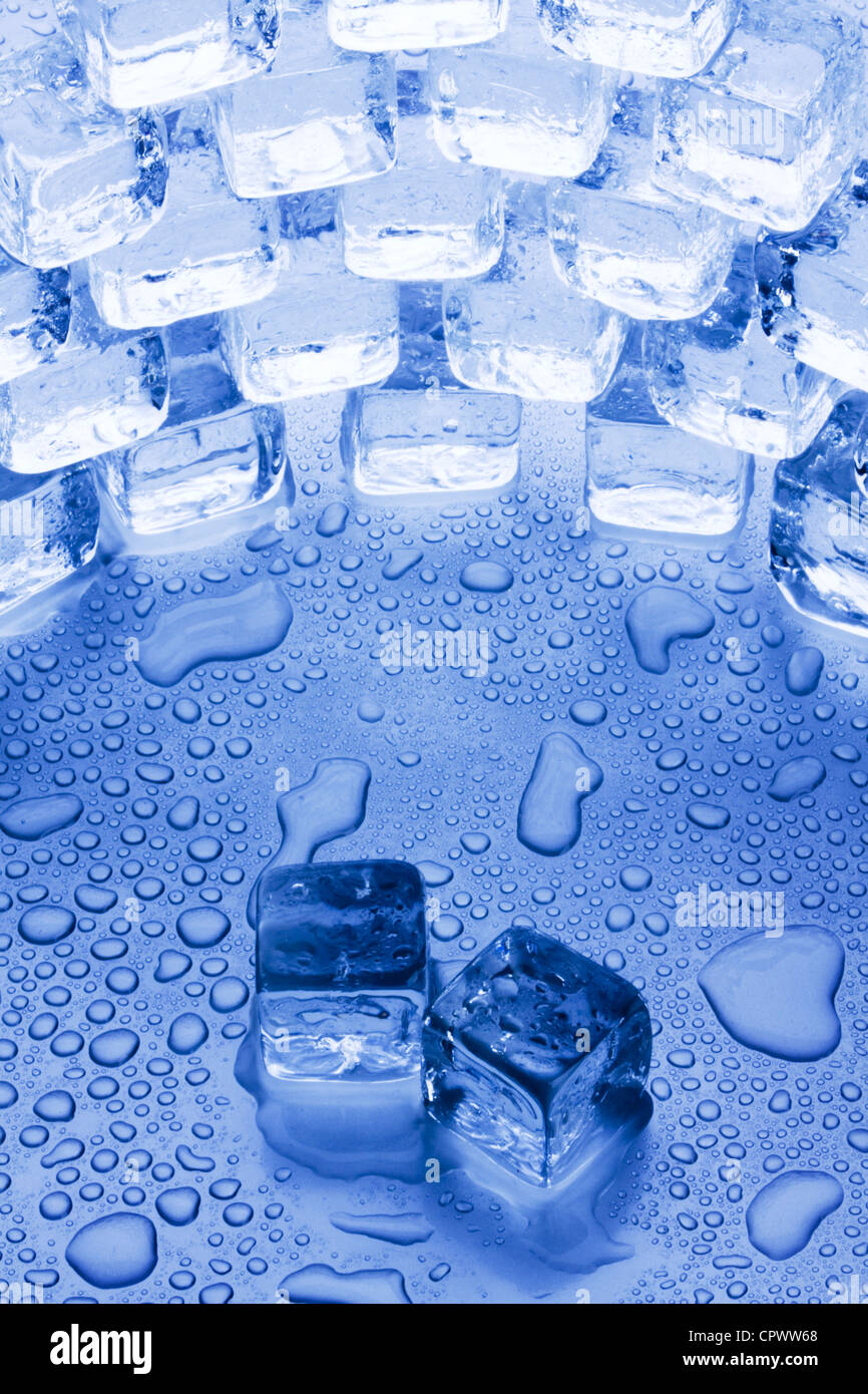 ice cubes in blue background Stock Photo - Alamy