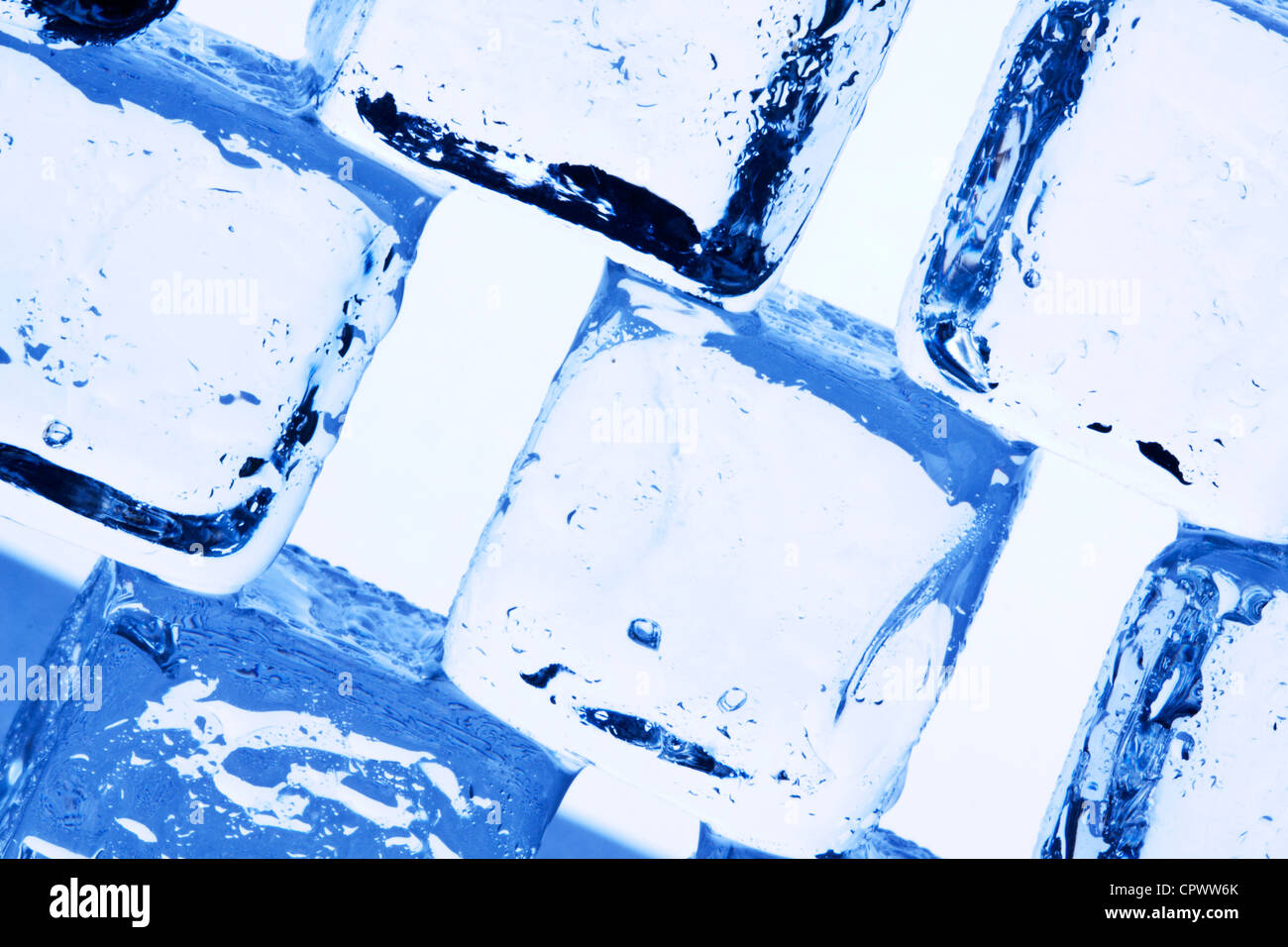 ice cubes in blue background Stock Photo - Alamy