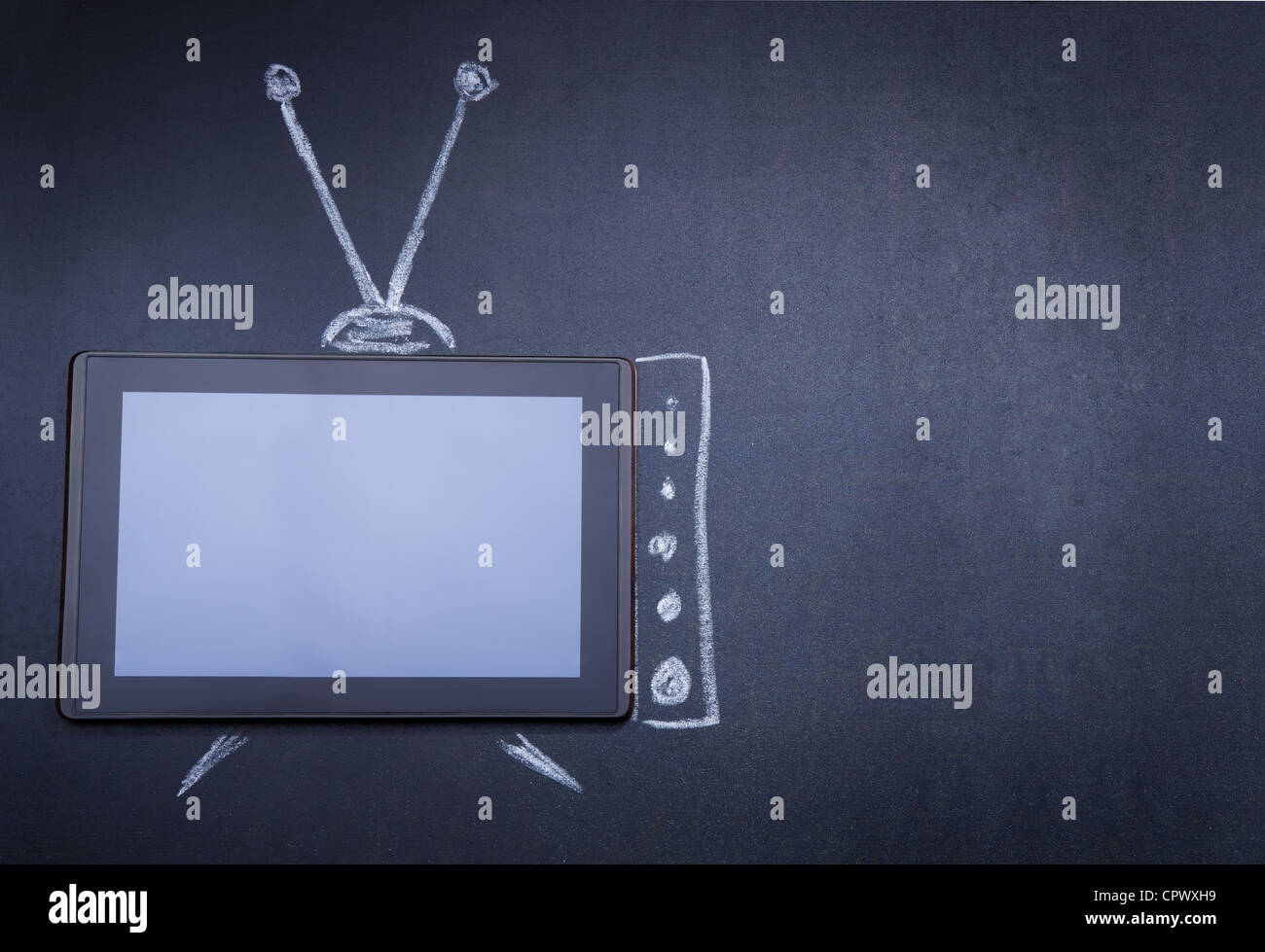 Tablet computer as TV on the blackboard with tripod and strobe drawn ...