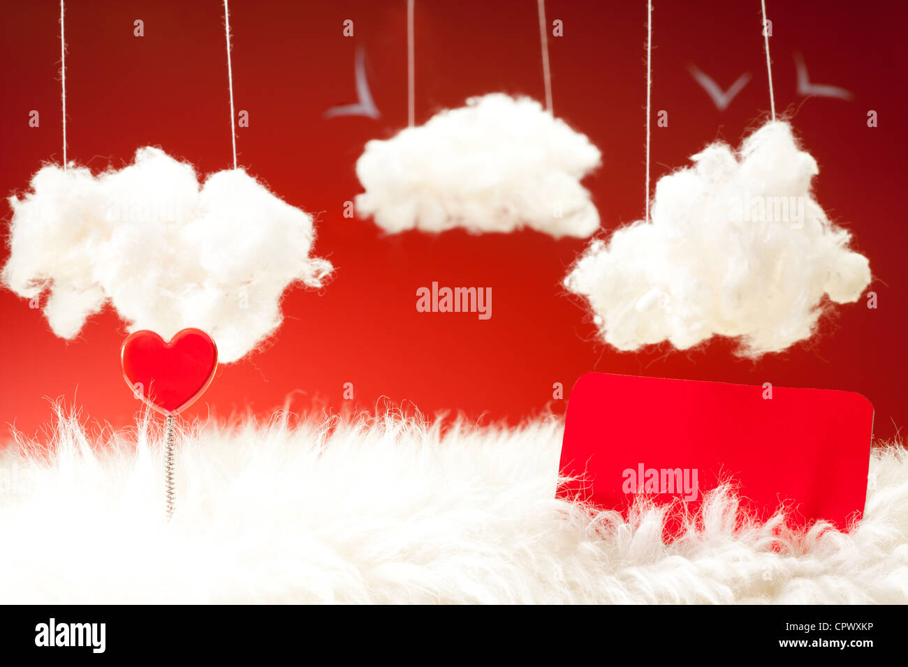 Valentine day theme with red heart on a spring and card to add text to ...