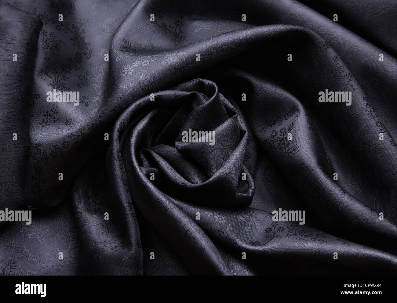 Beautiful folded black silk fabric Stock Photo - Alamy