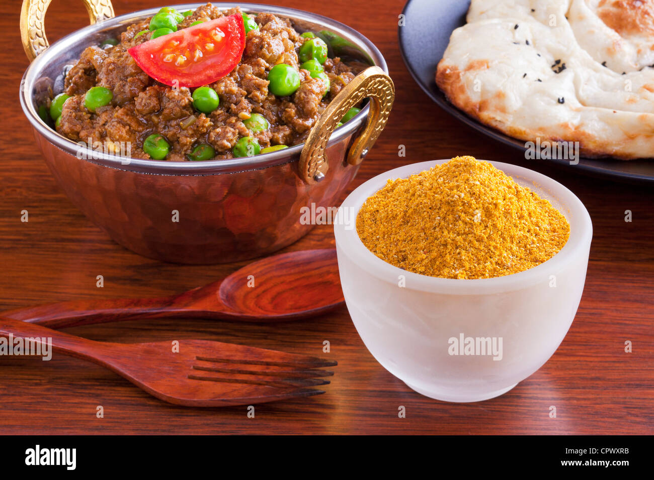 Curry powder with a beef mince curry, keema matar with peas, and naan ...