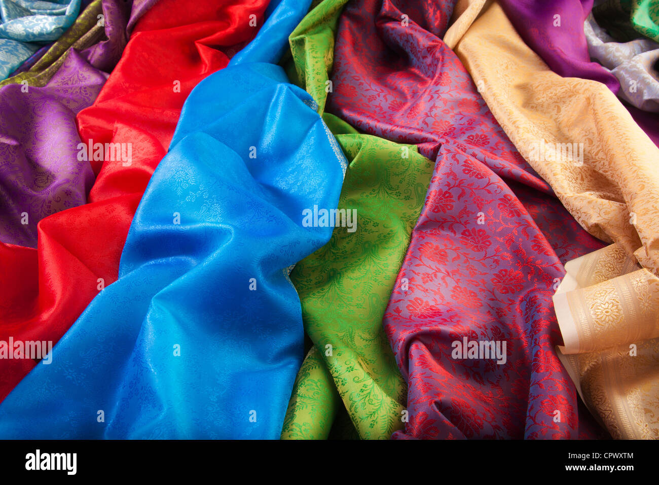 Best textile fabrics pile with vivid colors and amazing texture Stock ...