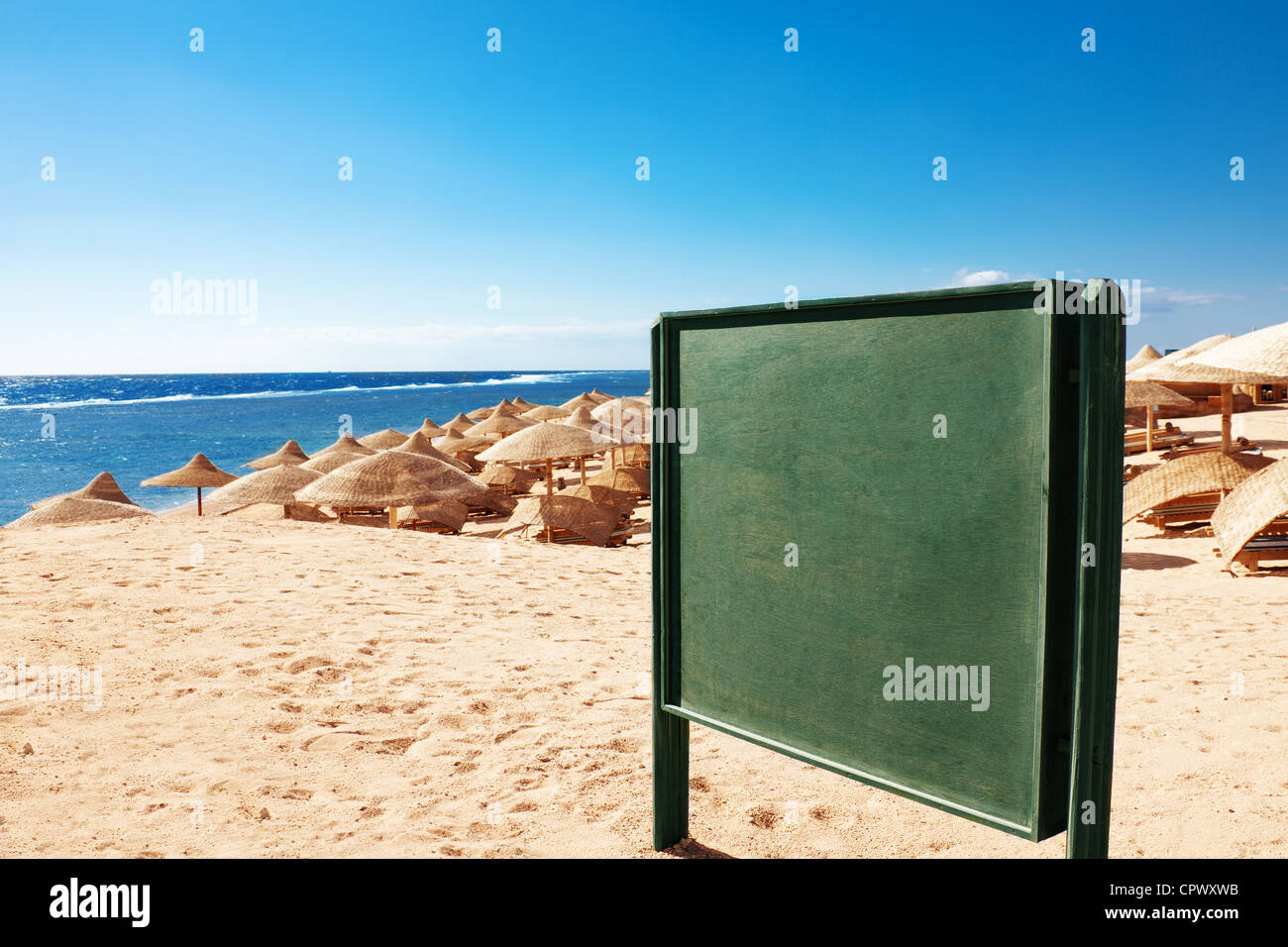Billboard on the beach Stock Photo - Alamy