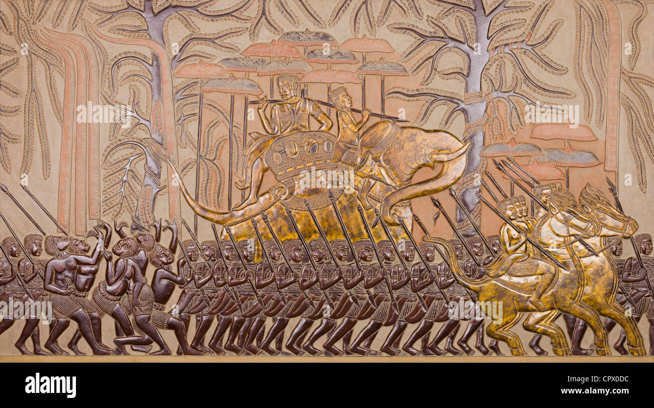 Depiction of an ancient Khmer war scene on a stone bas-relief carving ...