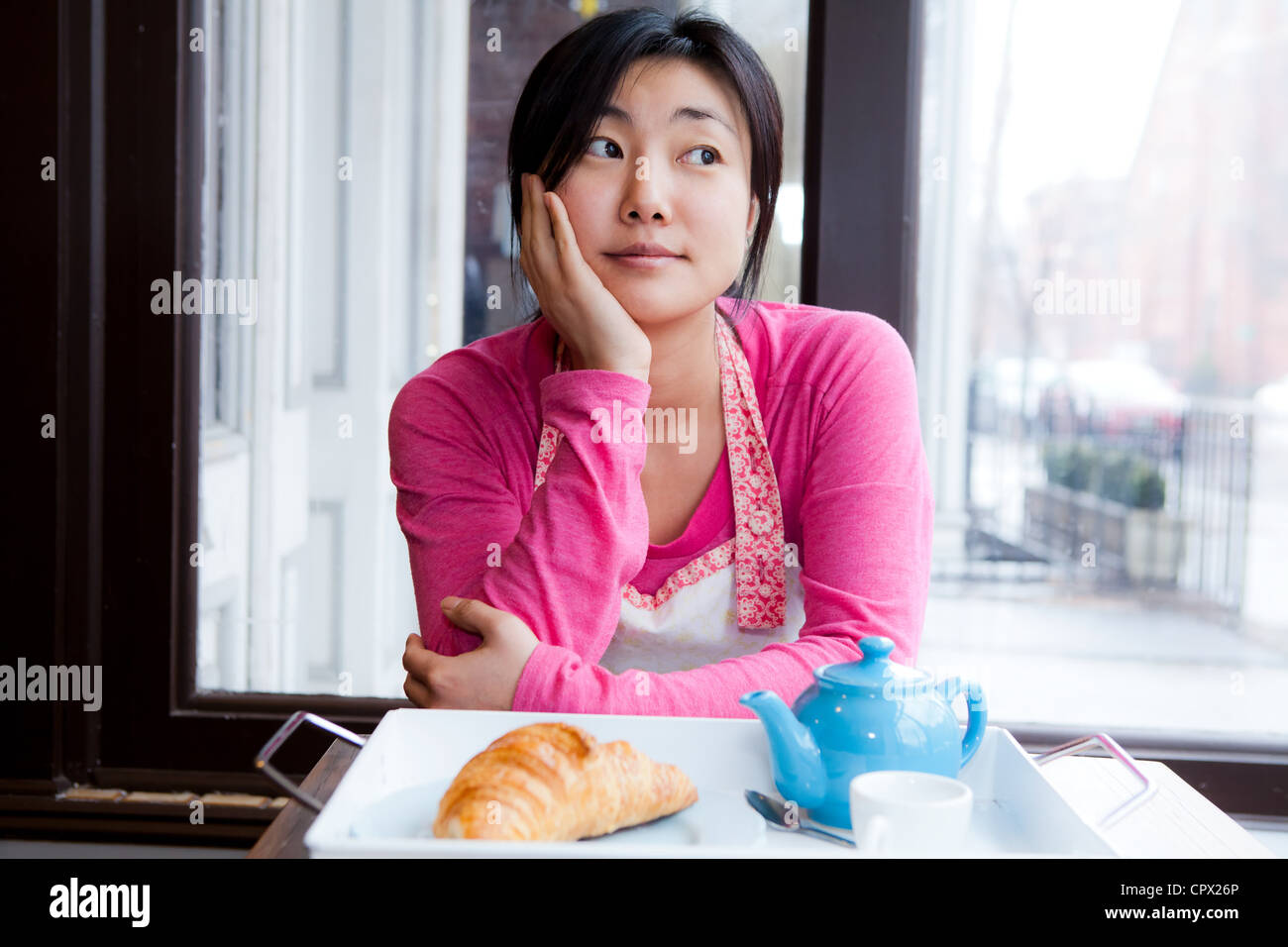 Female cafe owner thinking hi-res stock photography and images - Alamy