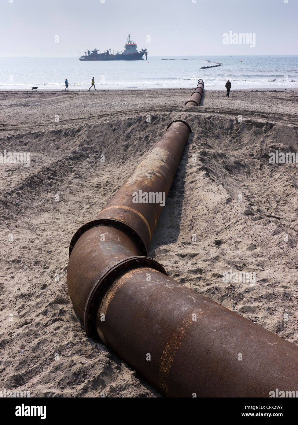 Sand replenishment on a Dutch North Sea beach to prevent coastal ...