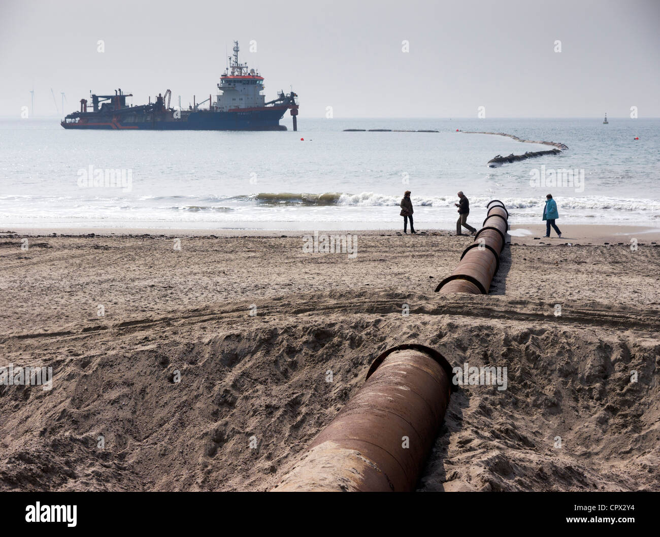 Sand replenishment on a Dutch North Sea beach to prevent coastal ...