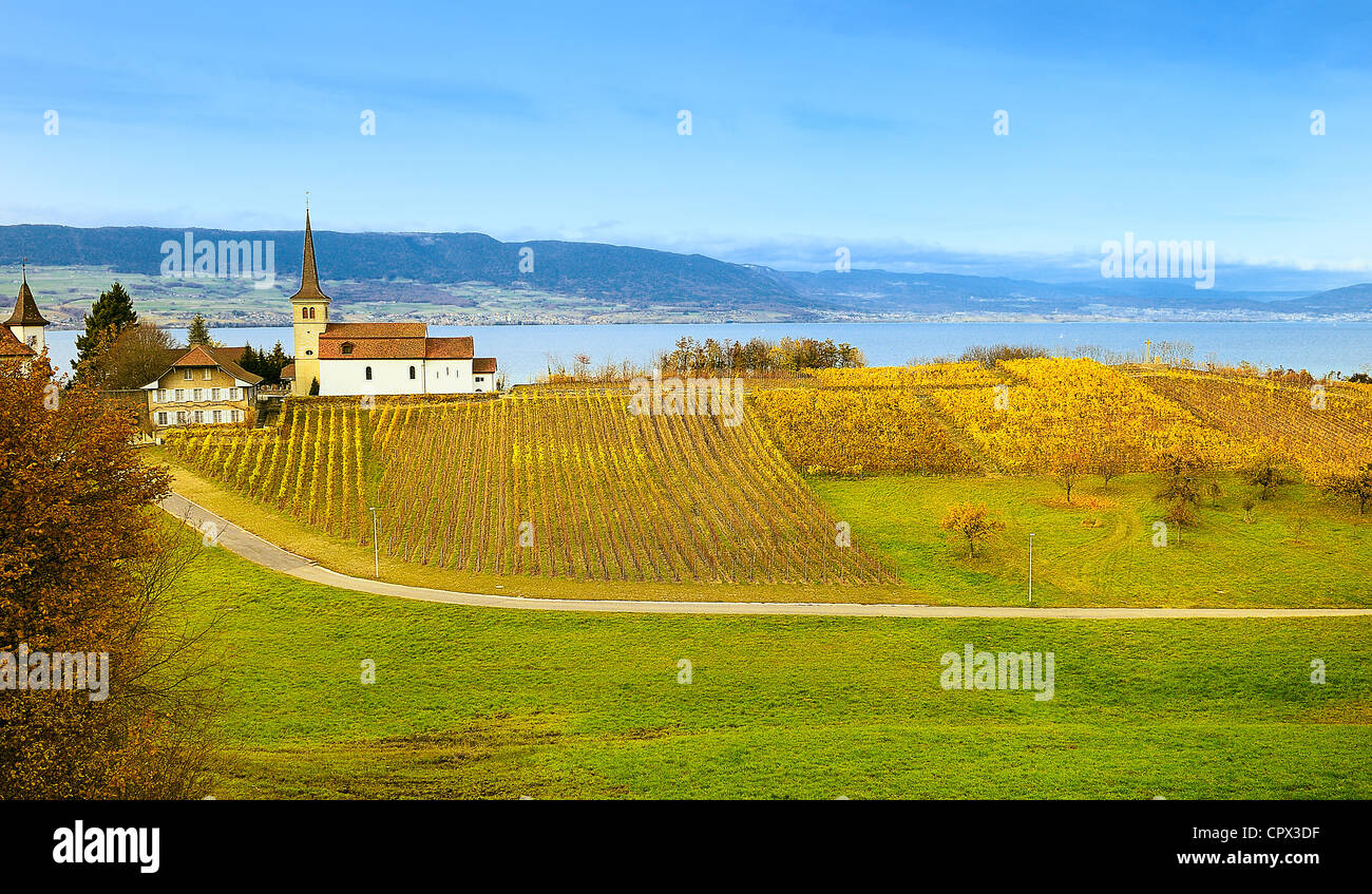 A small church is located above Lake Neuchatel, Switzerland Stock Photo ...