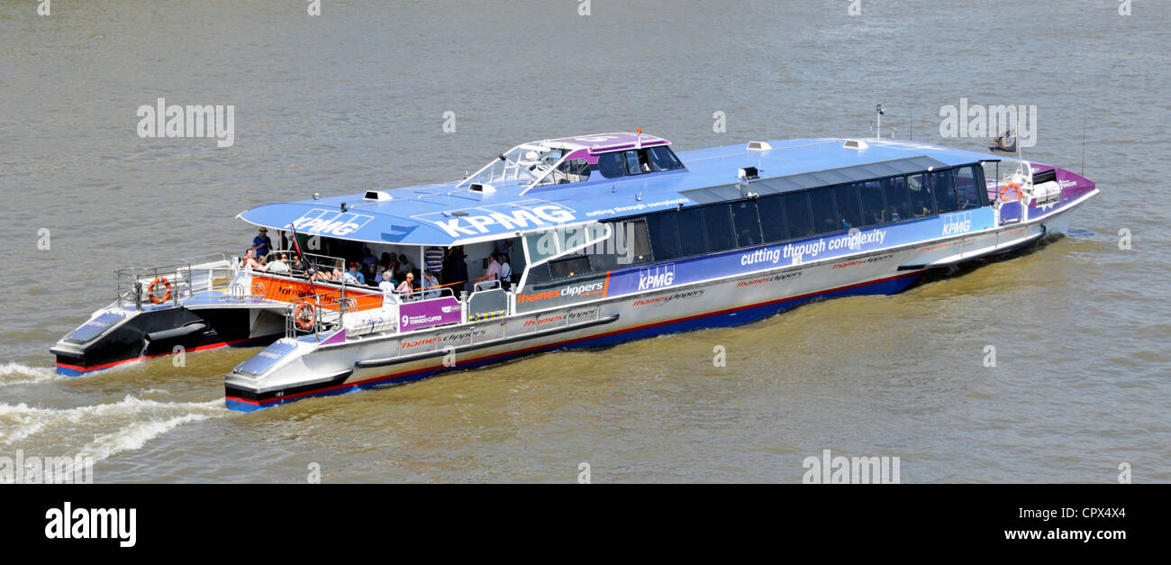 Thames Clipper riverboat commuter and tourist service carrying KPMG ...