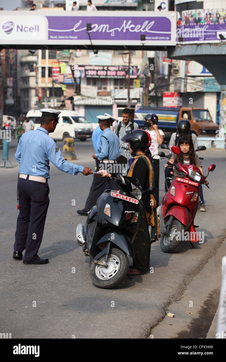 Police officer controlling a motorbike Nepal Stock Photo - Alamy