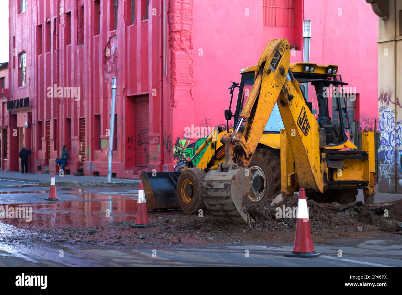 JCB Construction vehicle lifting rubble Stock Photo - Alamy