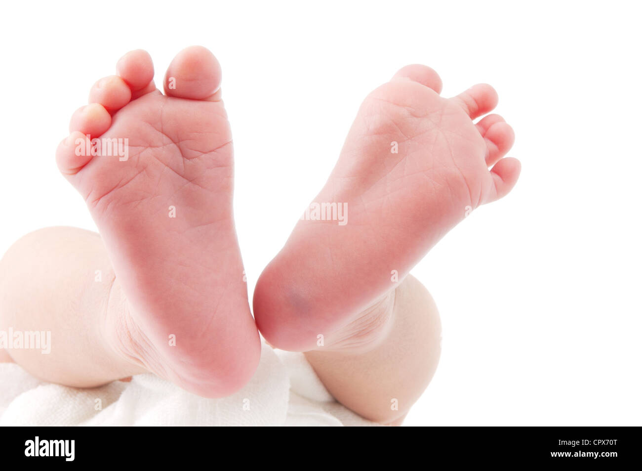 Newborn baby feet over white background Stock Photo - Alamy