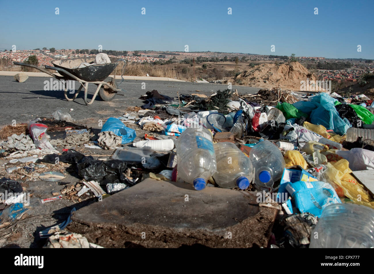 Landscape shot of a street full of litter Stock Photo - Alamy
