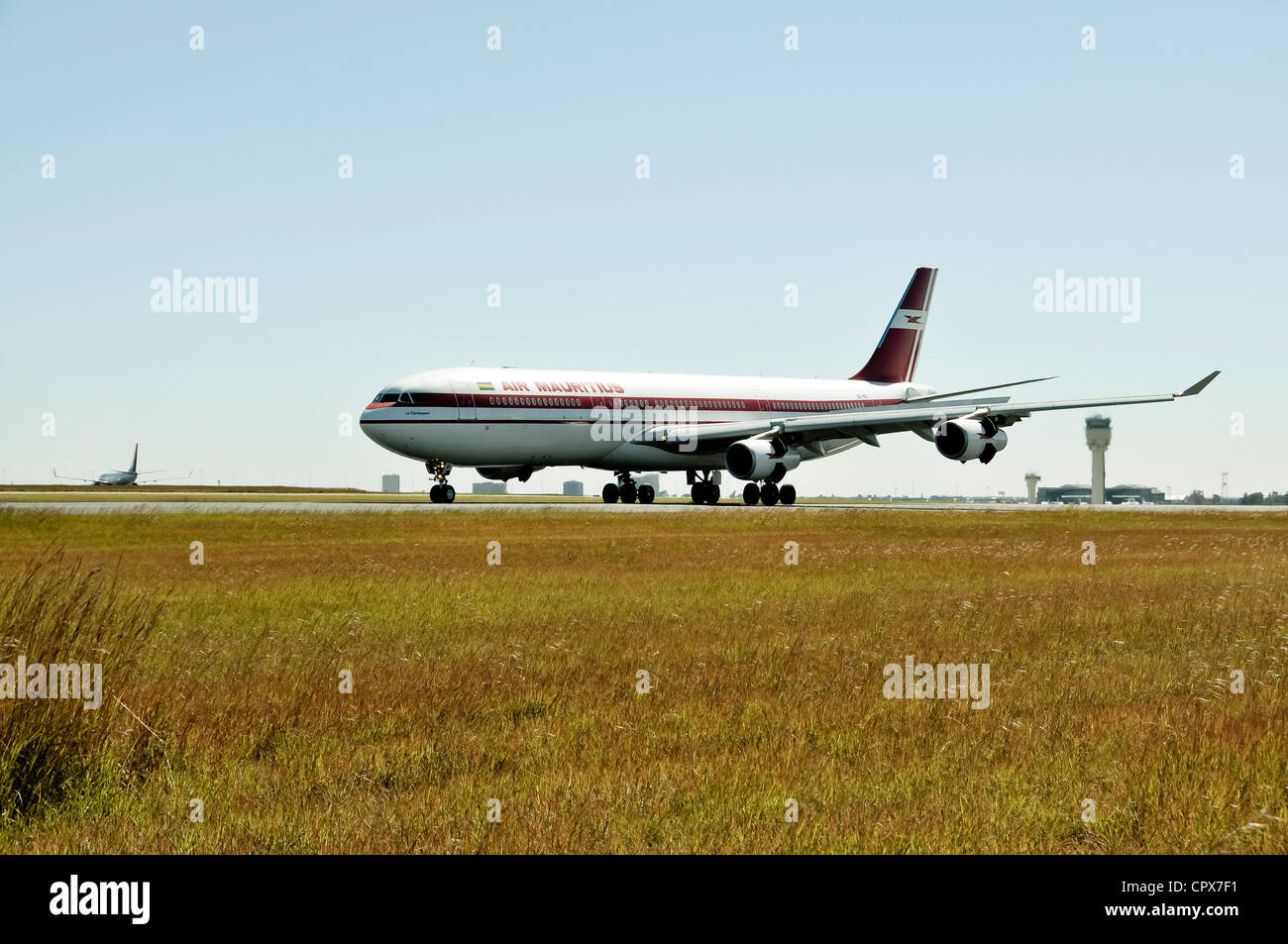 Airplane taking off from runway Stock Photo - Alamy