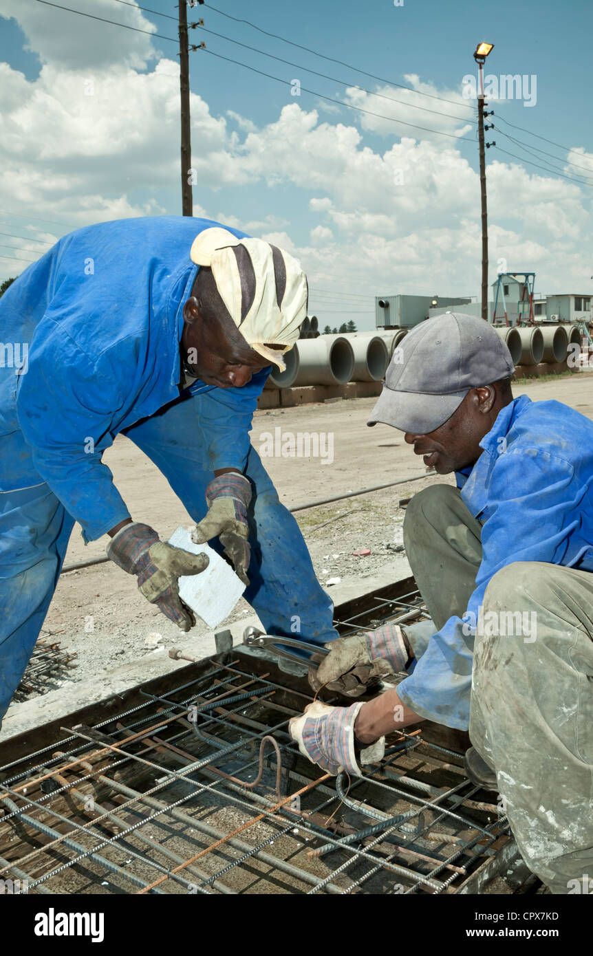 Construction worker carrying bricks hi-res stock photography and images ...