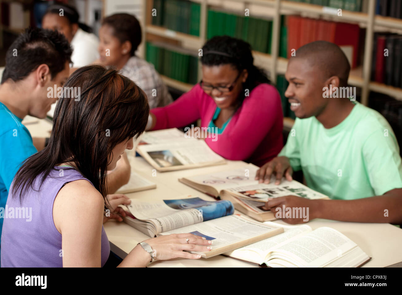Group of students studying together Stock Photo - Alamy