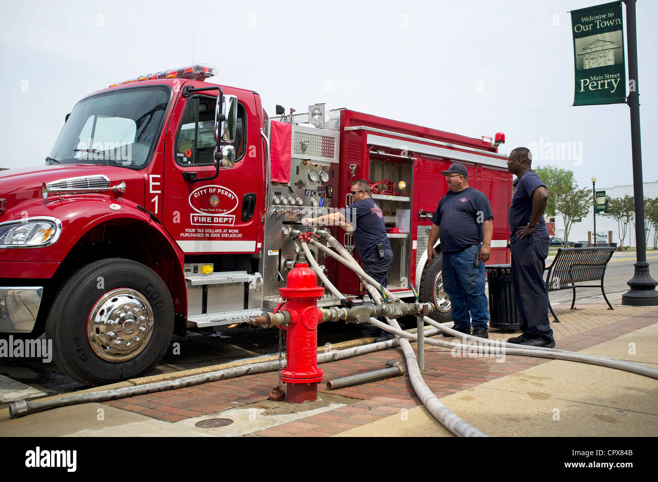 Fire hose hydrant truck hi-res stock photography and images - Alamy
