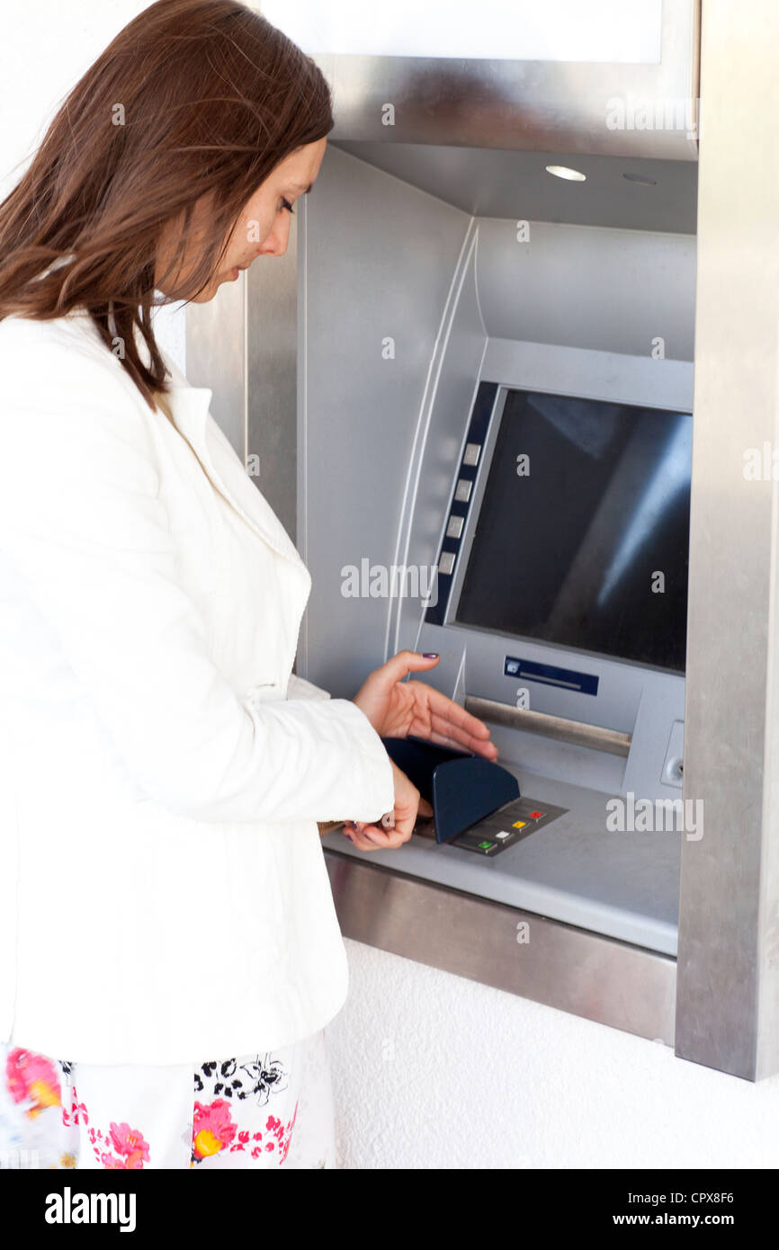 woman enters the PIN number at the ATM Stock Photo - Alamy