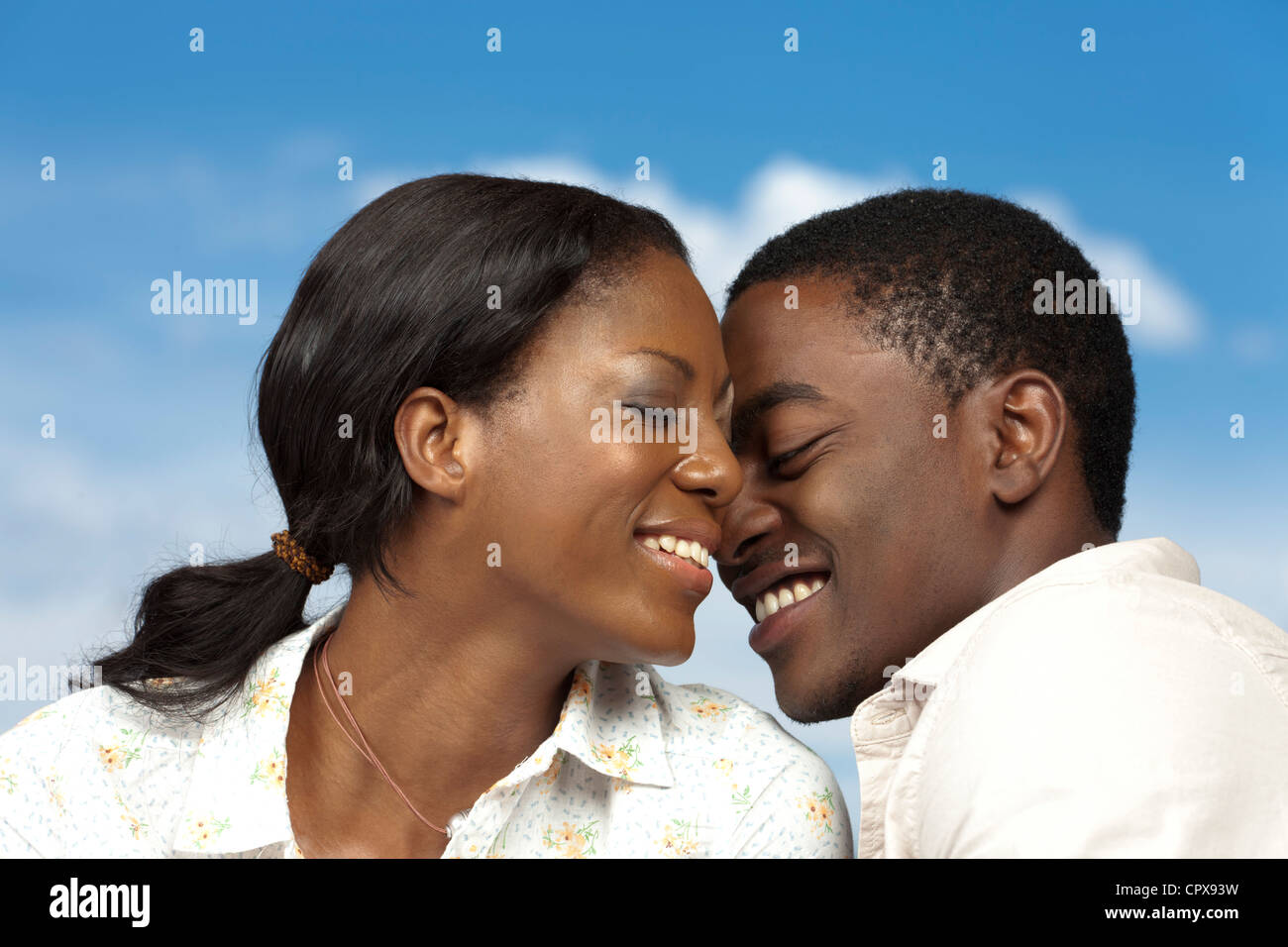An African couple sharing a happy moment together Stock Photo - Alamy