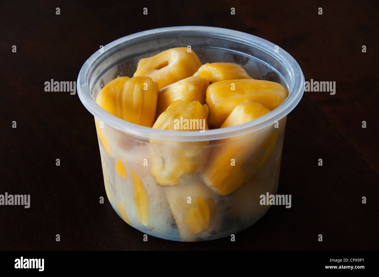 An open container of seeded fresh raw jackfruit is ready to eat Stock ...