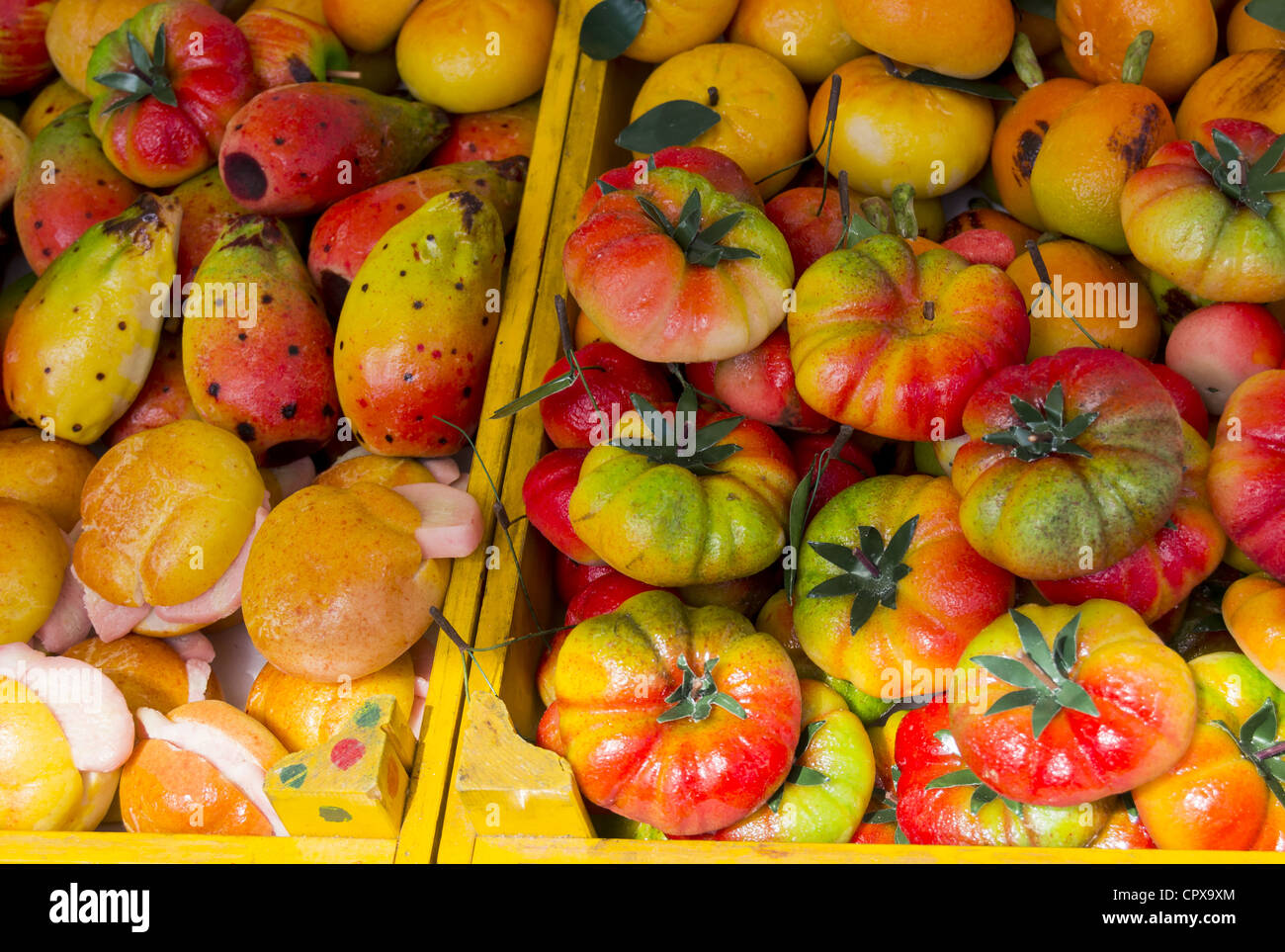 marzipan candies on a bench of the fair Stock Photo - Alamy
