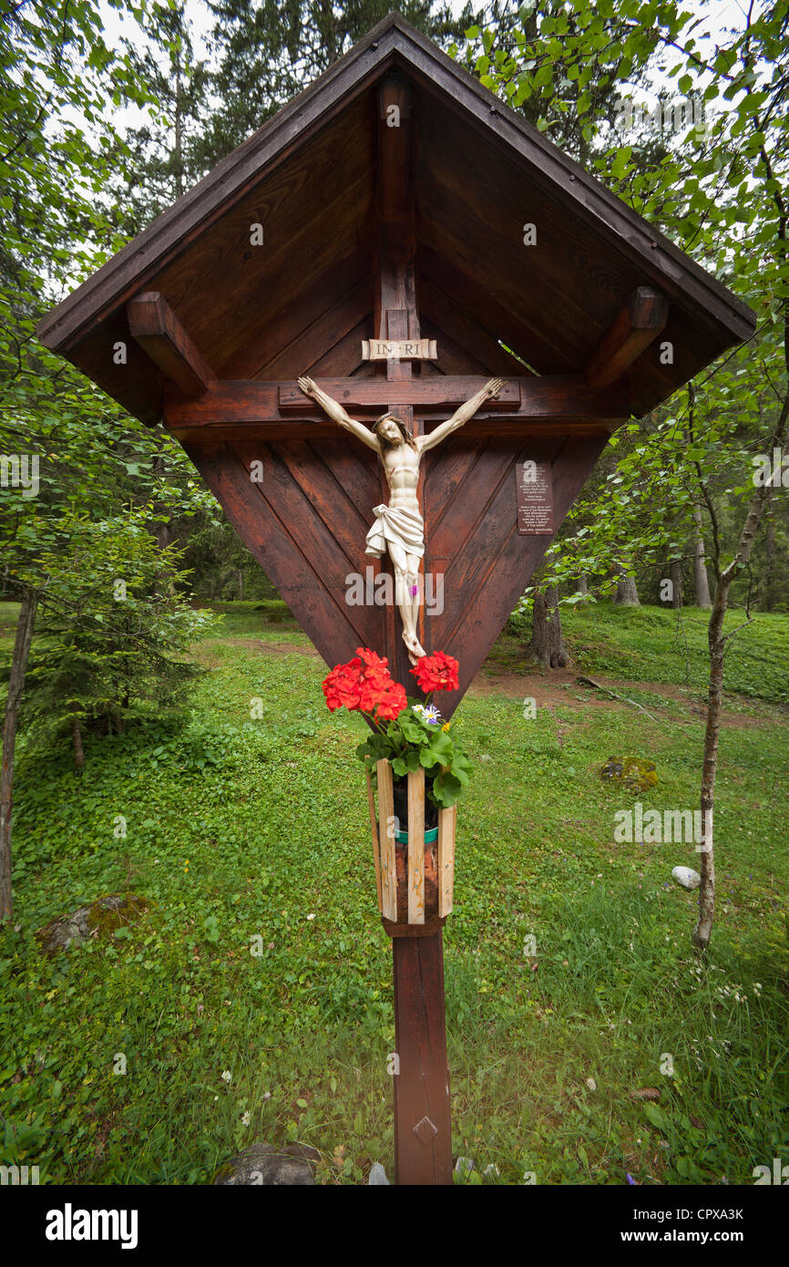 Wayside cross, or Wegkreuz, in the mountain valley of Trafoi, South ...