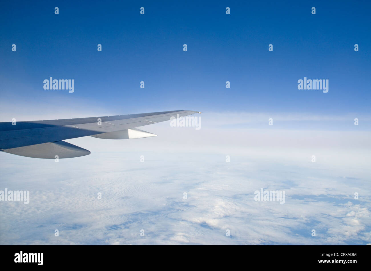 View of blue sky and clouds from B752 airplane. January 2012 Stock ...