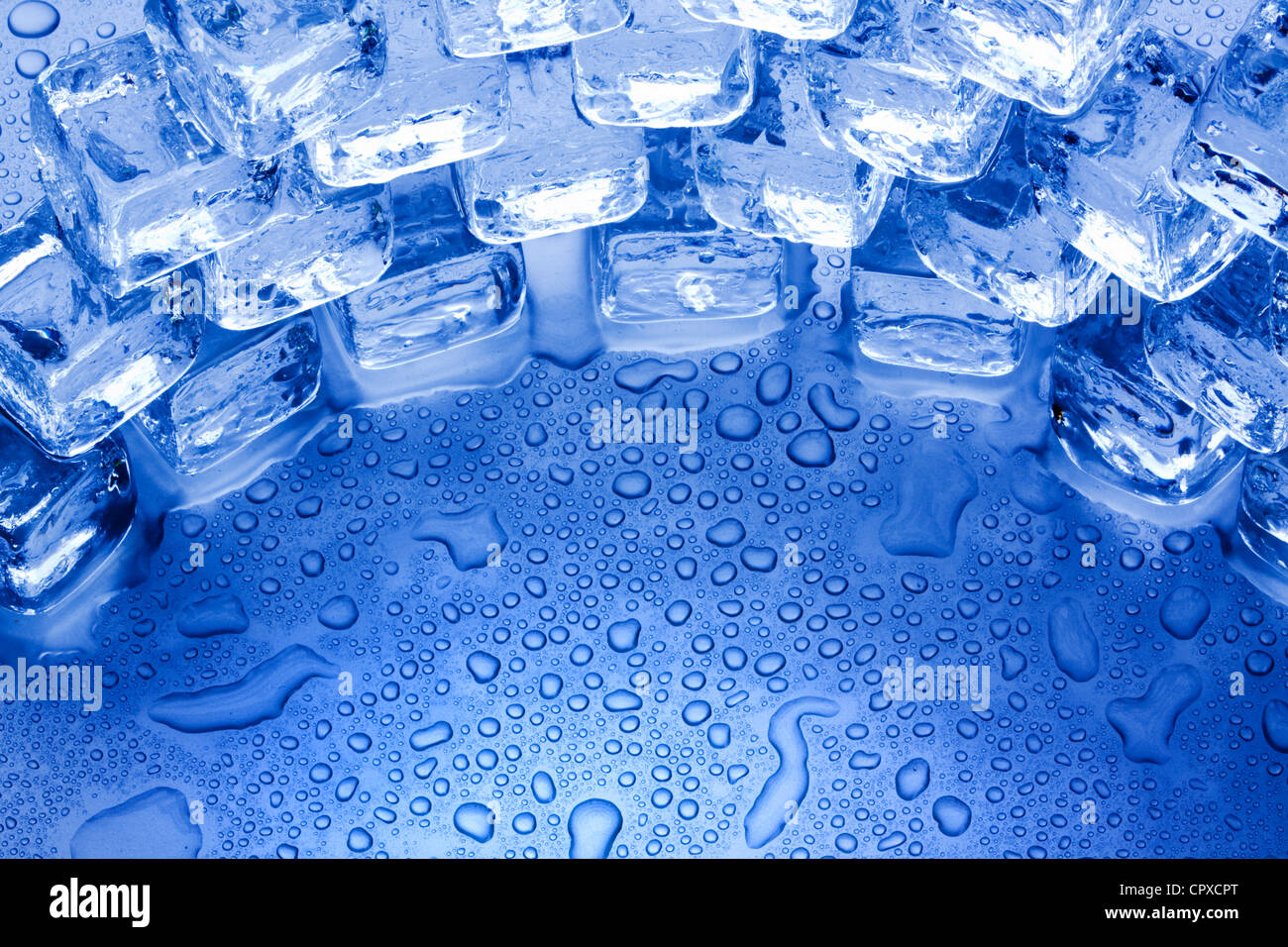 ice cubes in blue background Stock Photo - Alamy