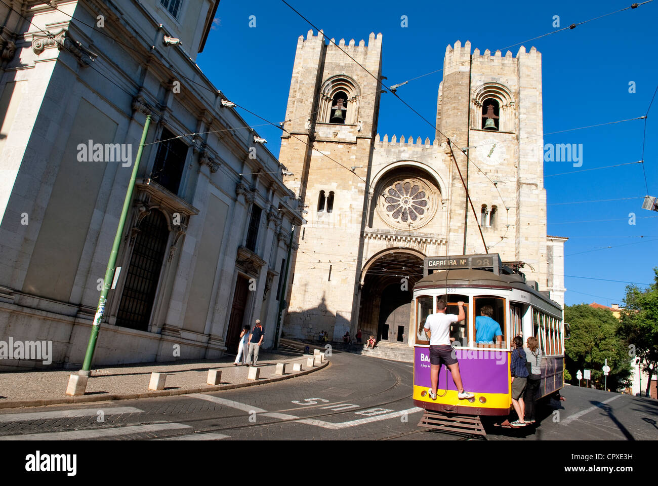 Portugal, Lisbon, Alfama District, tramway along the Largo da Se and Se ...