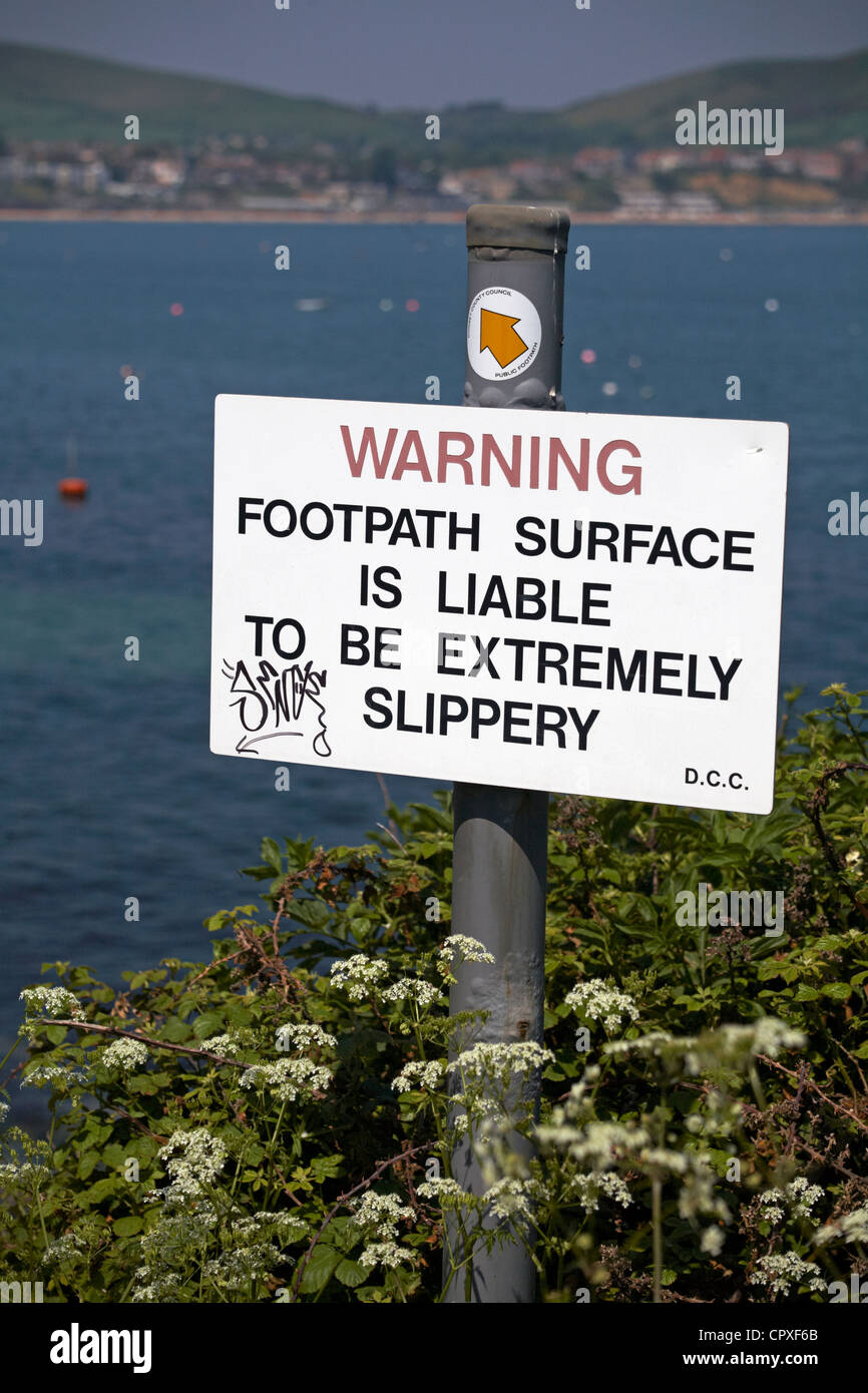 Caution slippery surface sign hi-res stock photography and images - Alamy