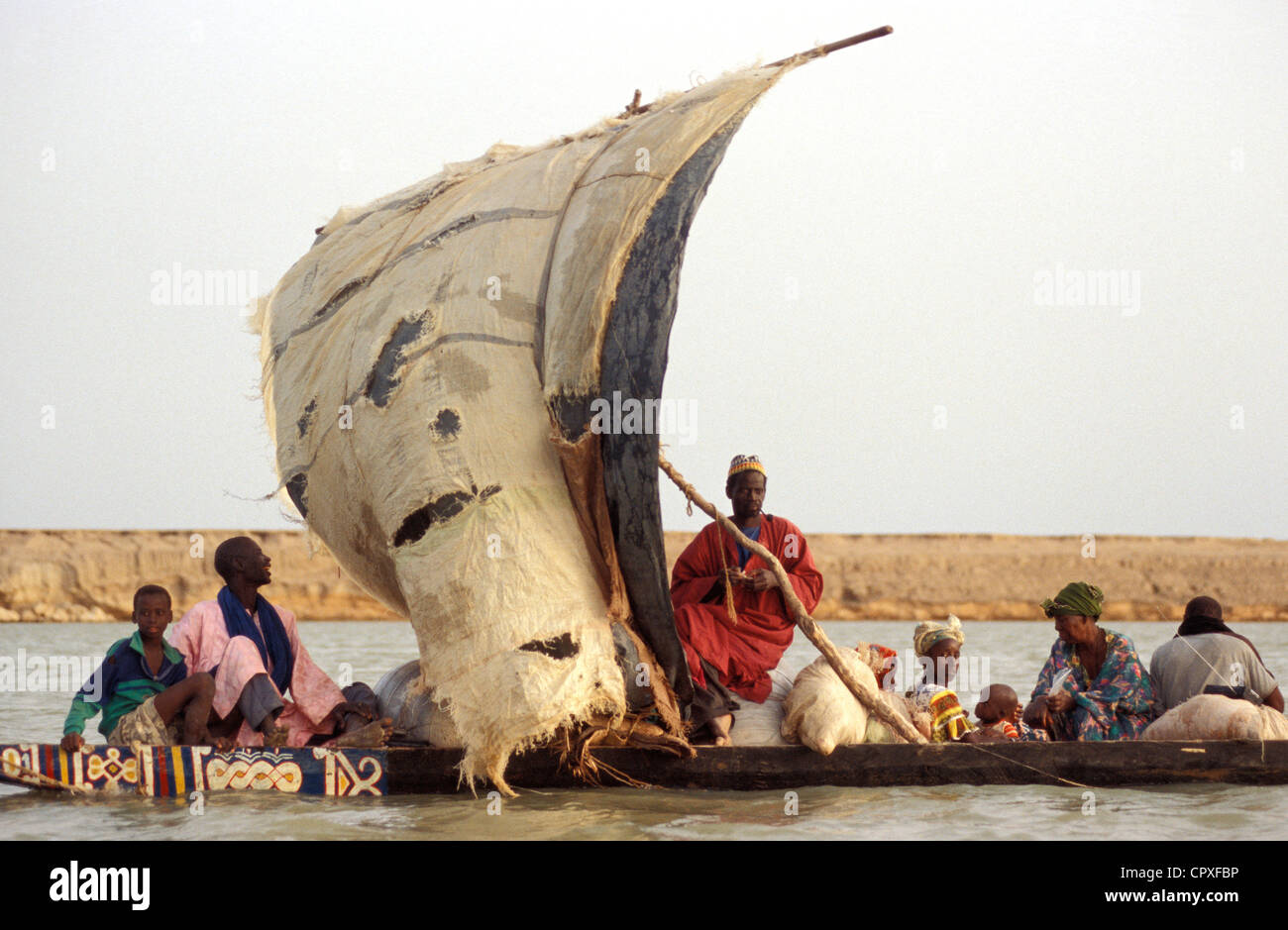 Mali Niger river Family on a pirogue coming back from market at Koa It ...