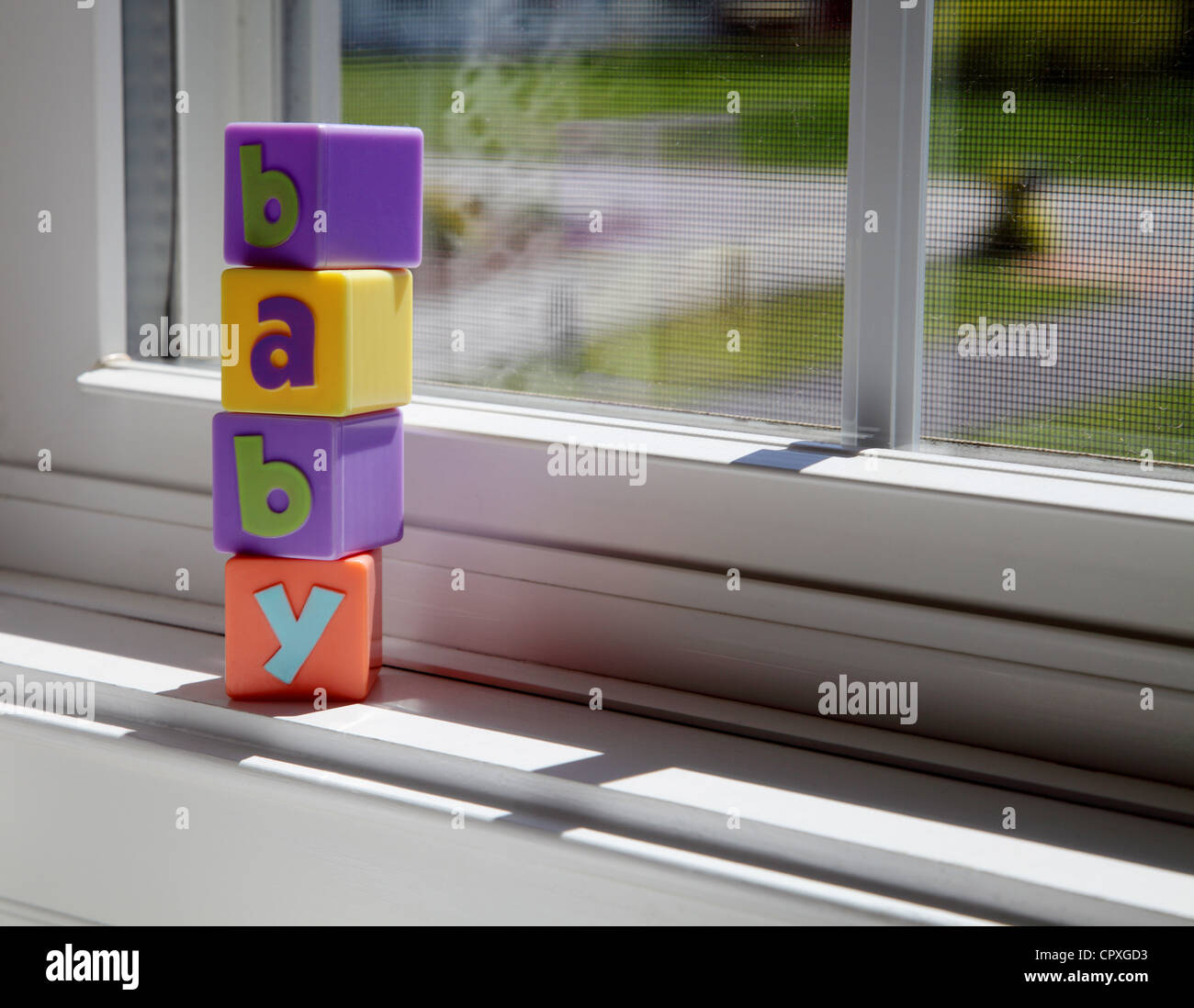 Baby alphabet block hi-res stock photography and images - Alamy
