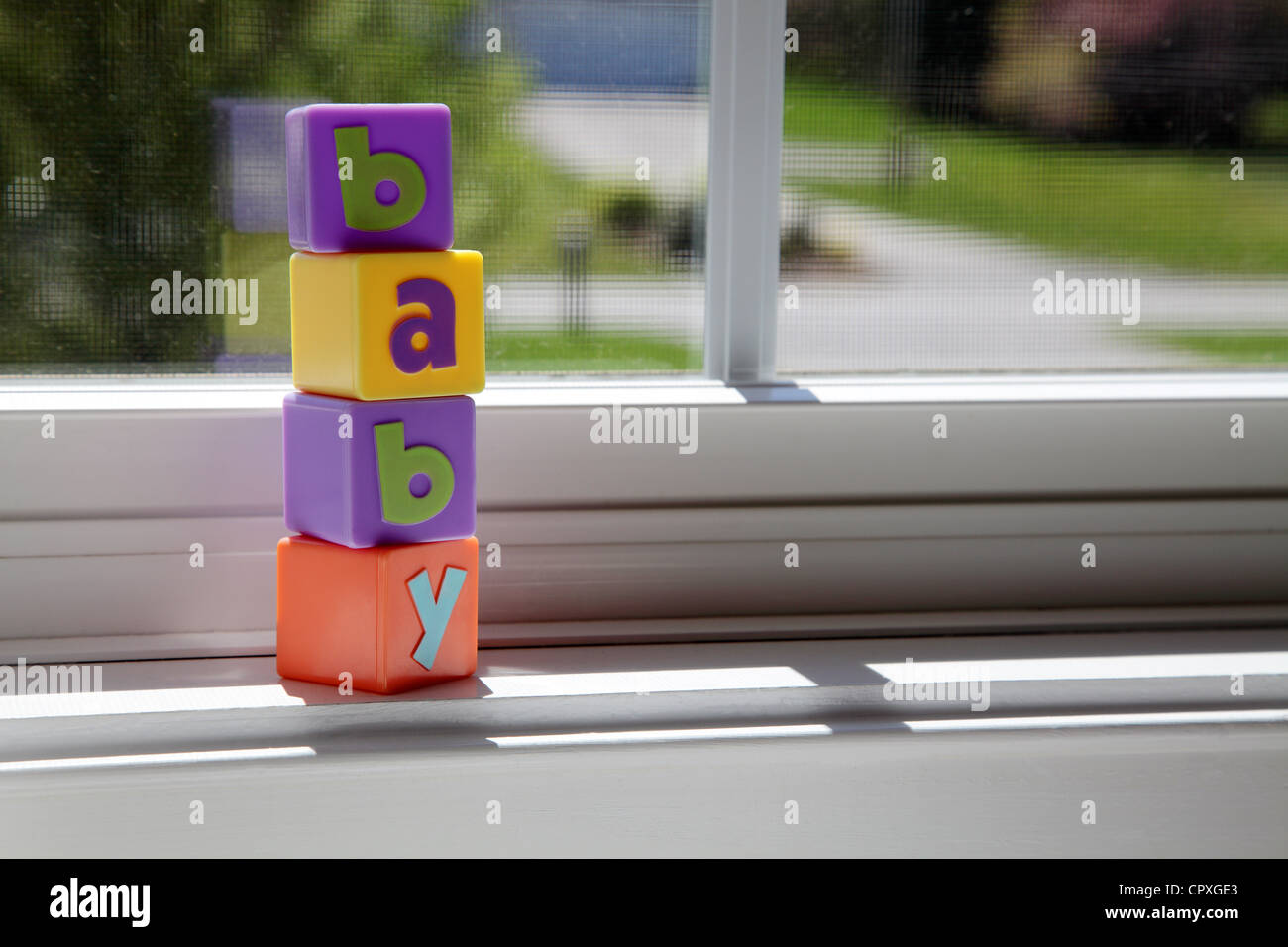 Baby alphabet block hi-res stock photography and images - Alamy