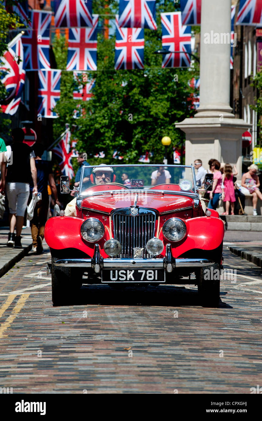 Vintage MG passing through Covent Garden, London, United Kingdom Stock ...