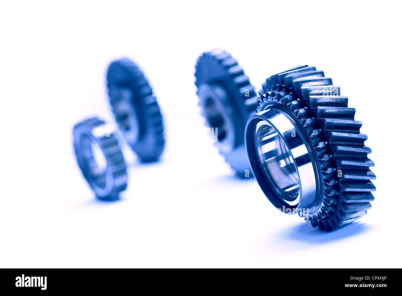 Colorfull gears isolated on white background Stock Photo - Alamy