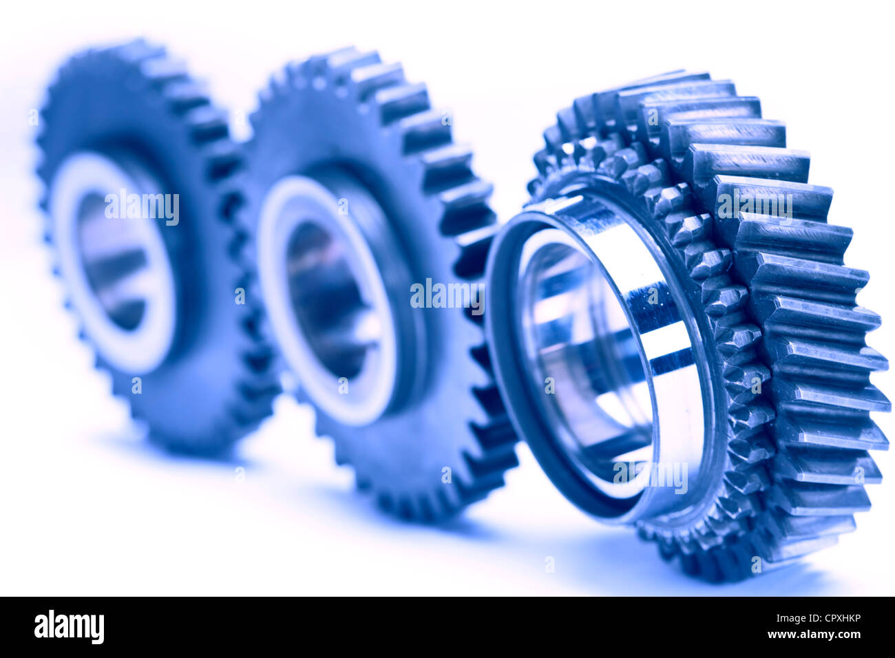 Colorfull gears isolated on white background Stock Photo - Alamy