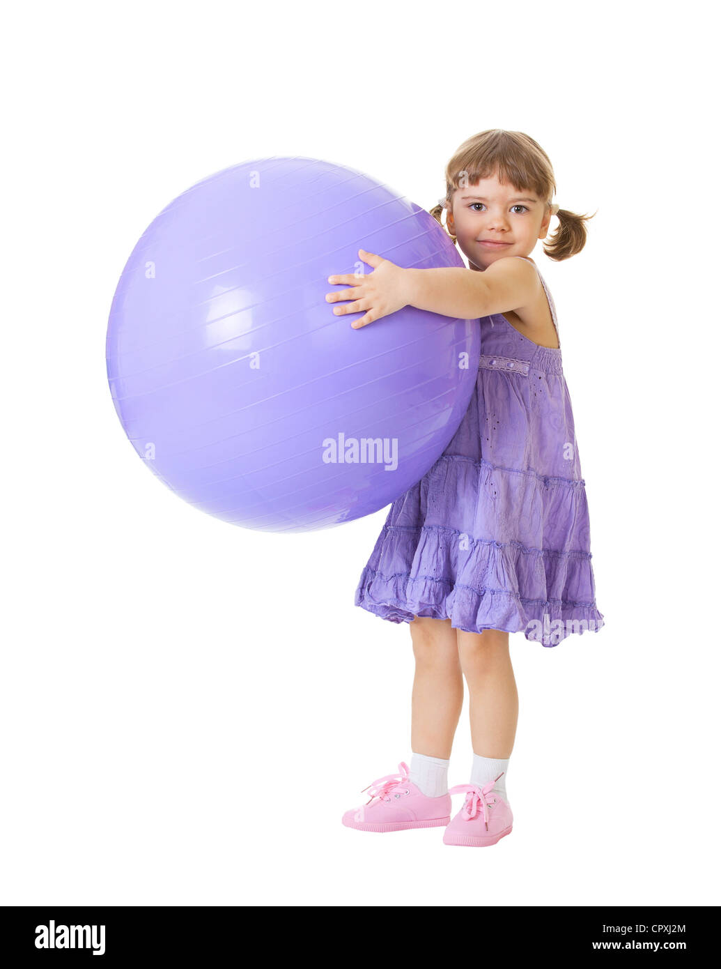 Little girl with a big purple ball isolated on white background Stock ...
