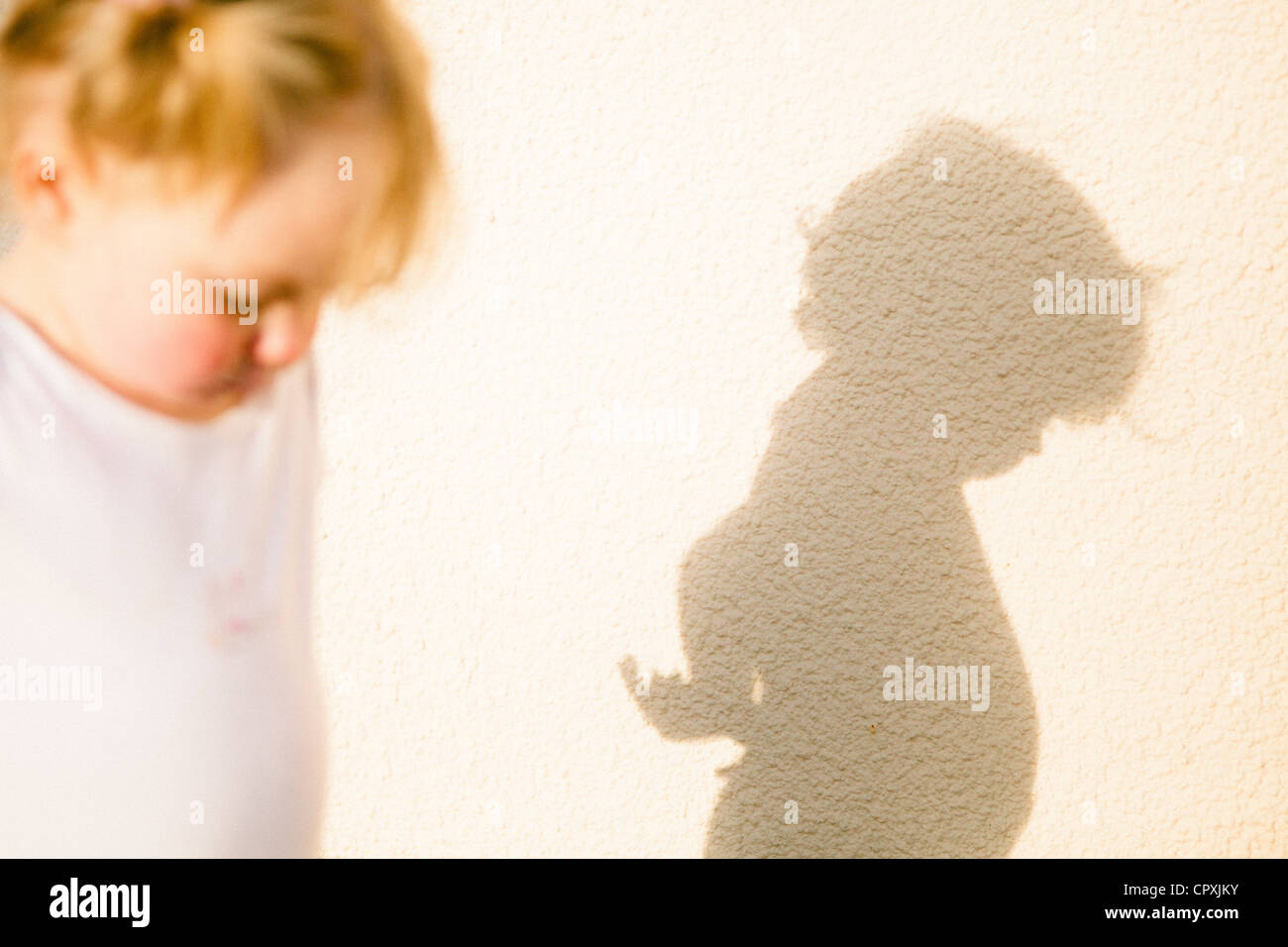 Child shadow hi-res stock photography and images - Alamy