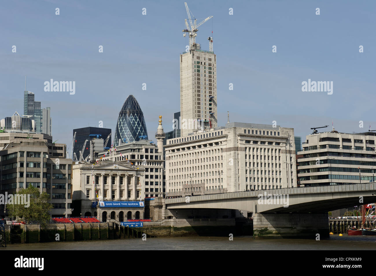 Thames river with the City of London in the background, London, England ...