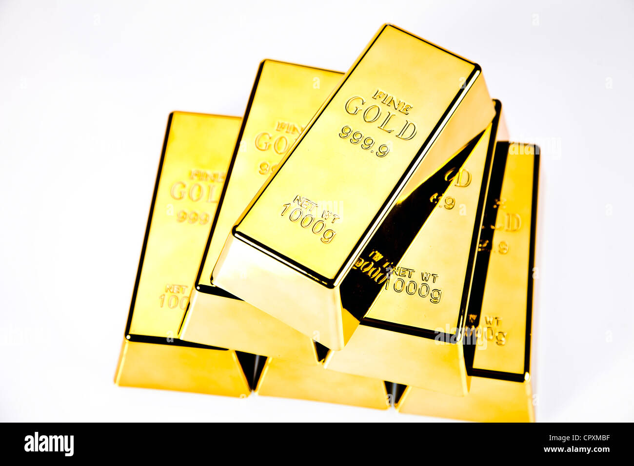 Gold bars on graphs and statistics Stock Photo - Alamy