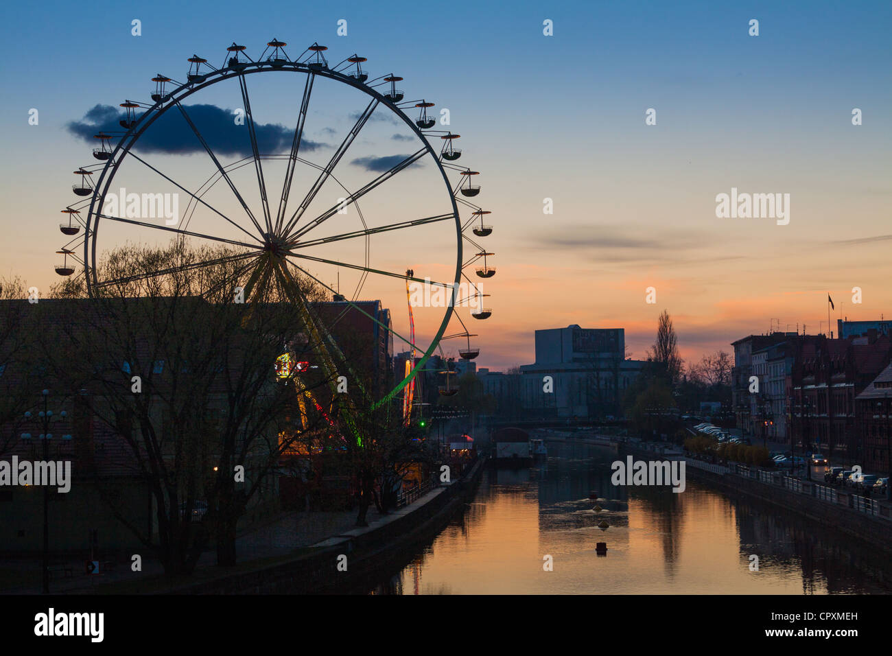 Ferris Wheel at sunset Stock Photo - Alamy