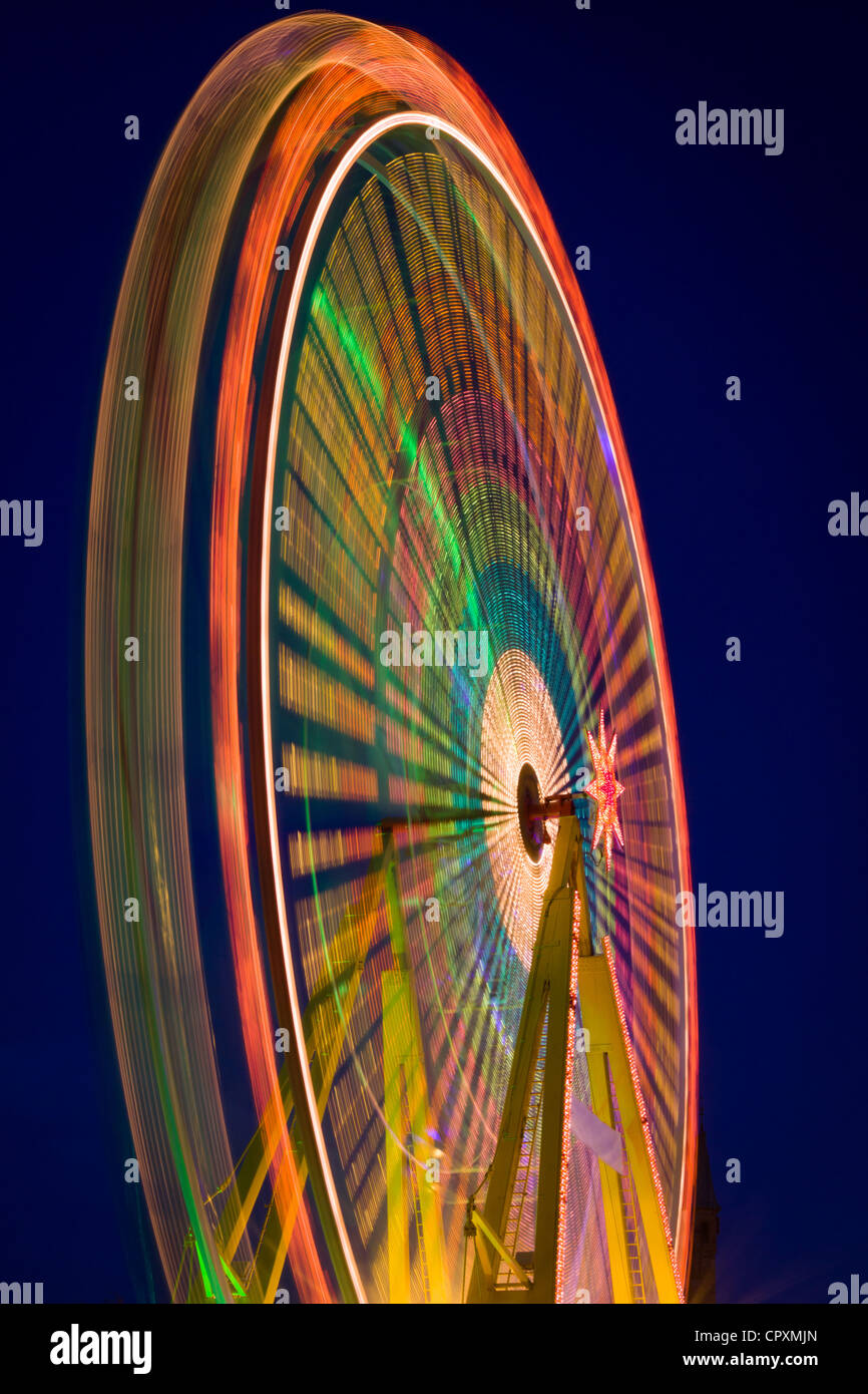 Turning Ferris Wheel Stock Photo - Alamy