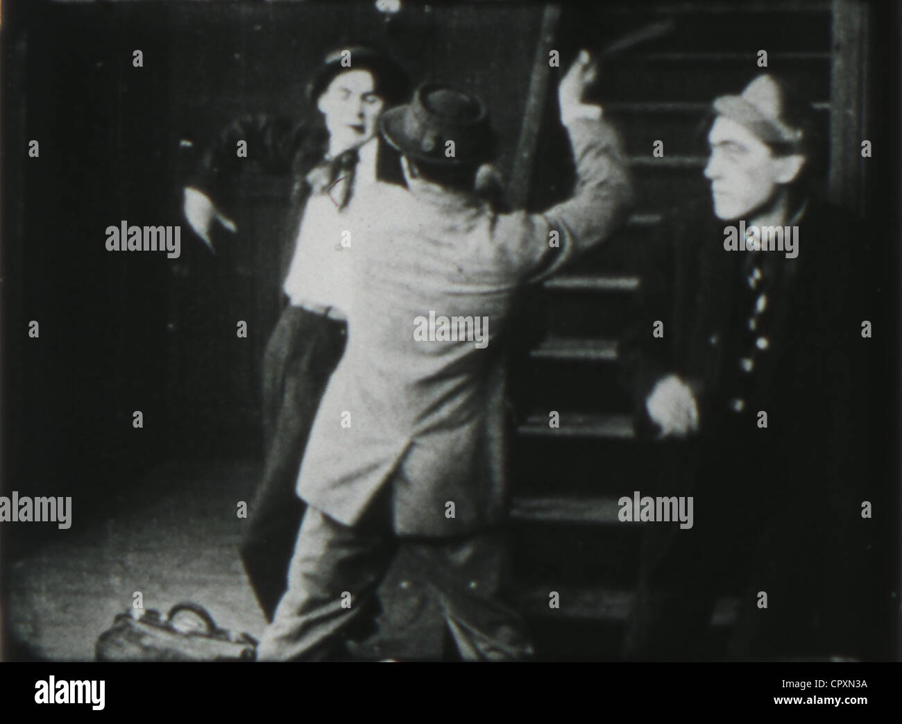 Still from D.W. Griffith's The Musketeers of Pig Alley (1912) released ...