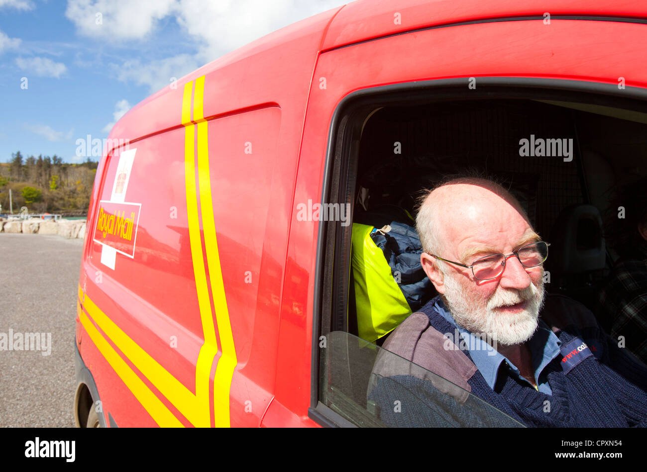 The postman on the Isle of Eigg, Scotland, UK Stock Photo - Alamy