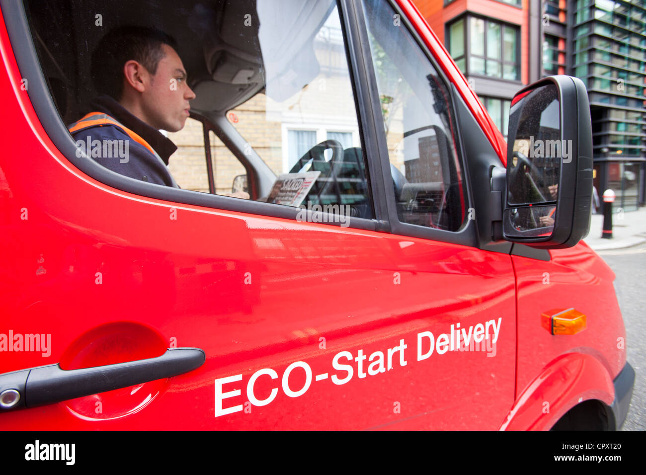 A Royal Mail van advertising its green credentials, the engine ...
